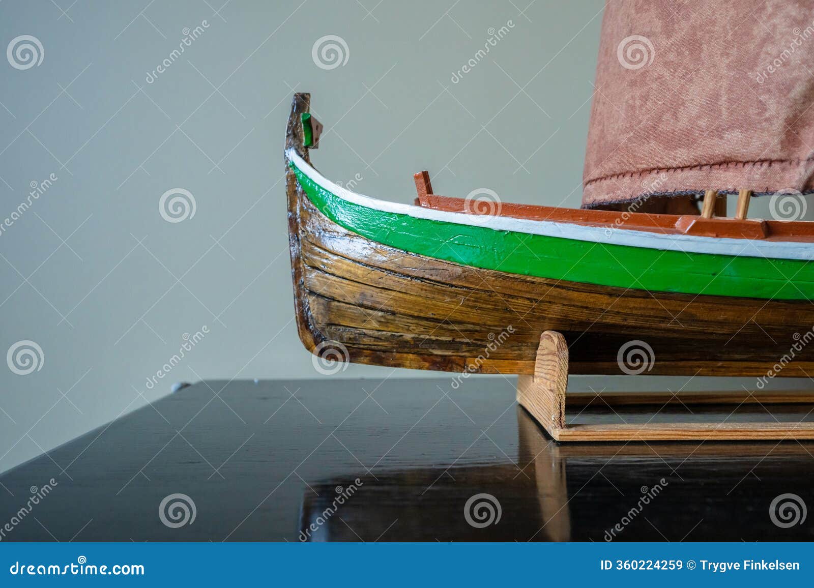 Wooden Model Boat with Green and White Detailing on Display.. Stock ...