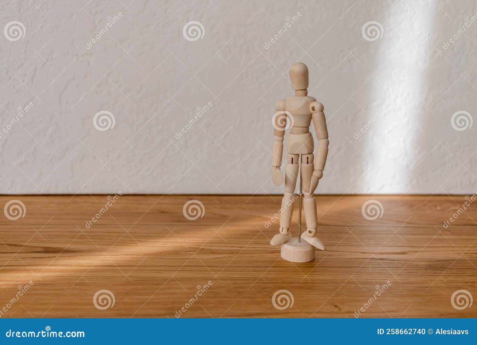 Model of a Man in a Beam of Light on a White Background Stock Photo ...