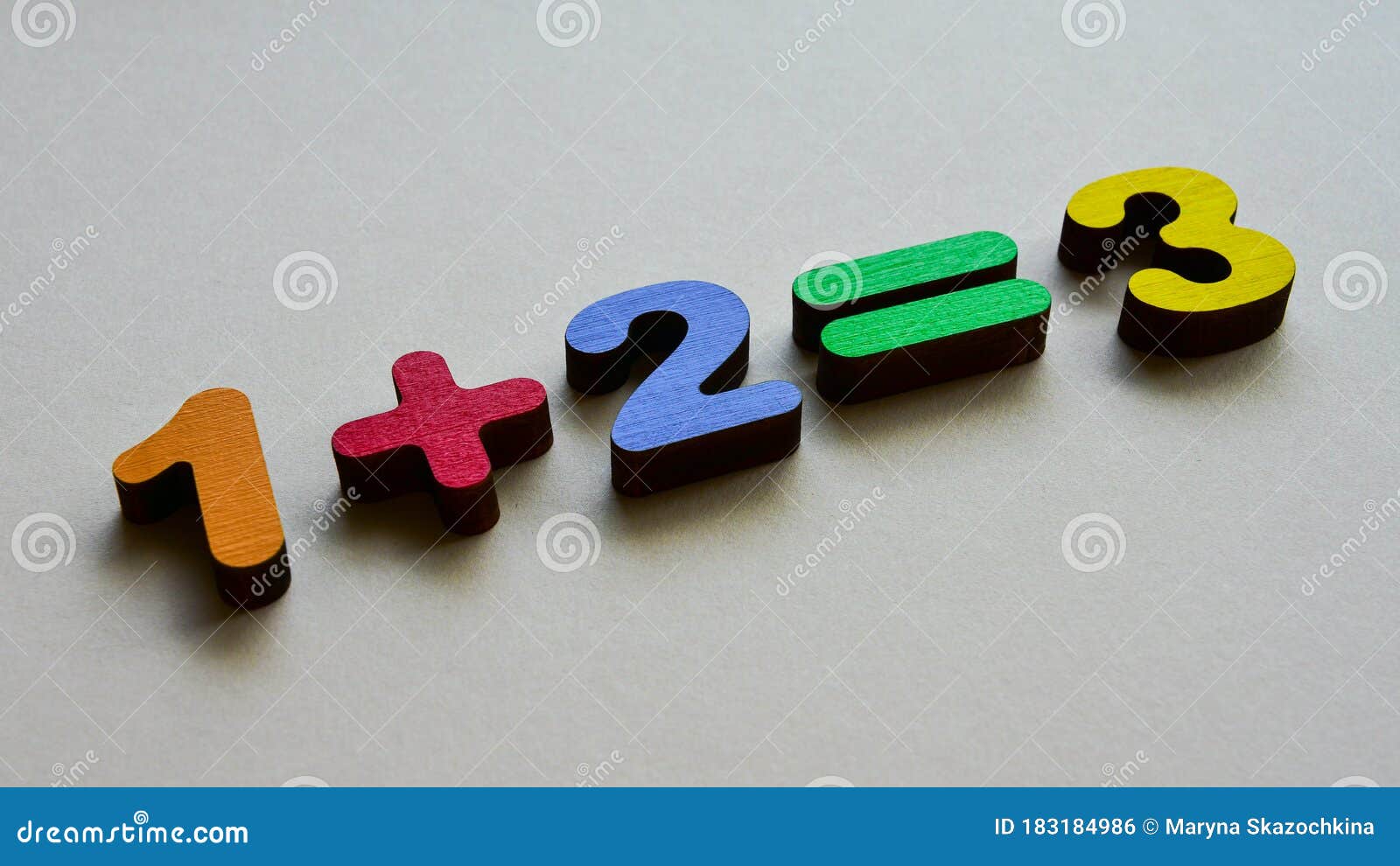 Wooden Multi-colored Numbers Illustrate the Addition Function on a ...