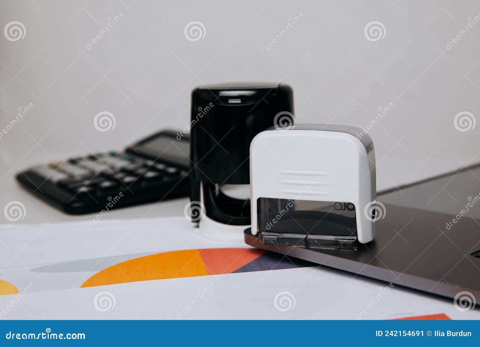 Wooden Office Desk Table with Laptop, Documents and Rubber Stamp Stock ...