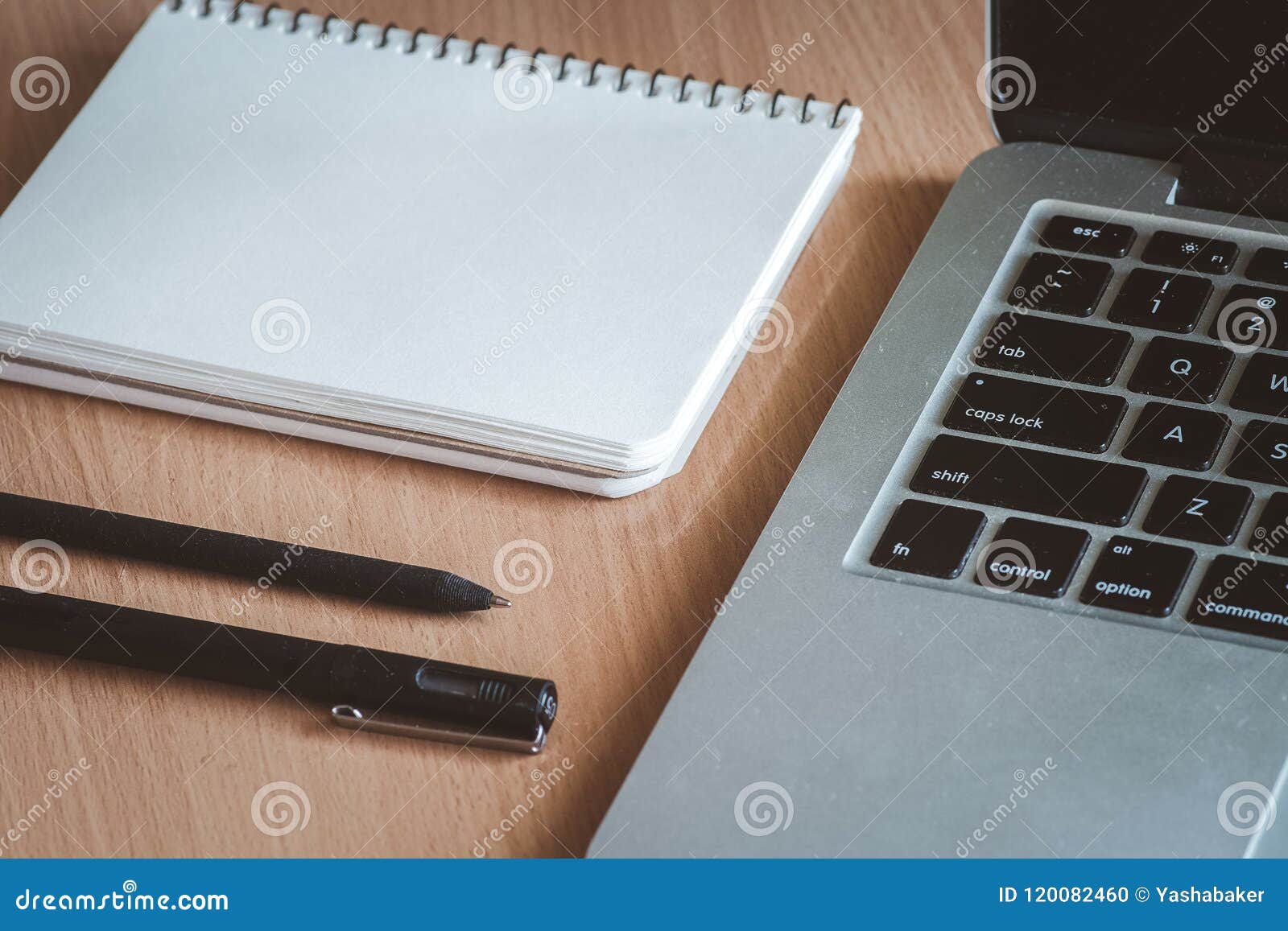 Wooden Office Desk Table with Notebook Open, Pens and Computer. Stock ...