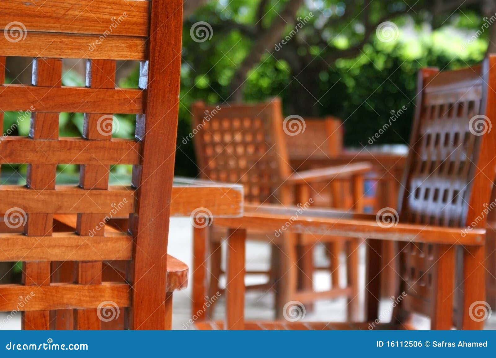 Wooden outdoor cafe chairs stock photo. Image of sunny - 16112506