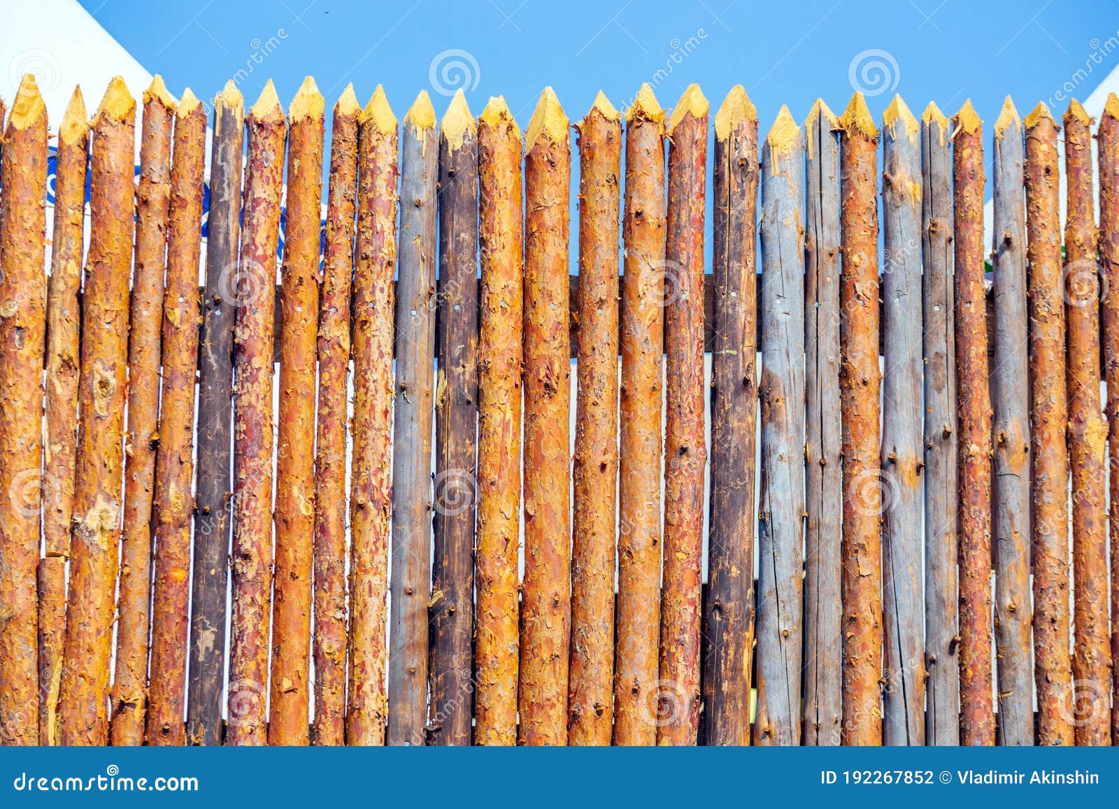 A Wooden Palisade Made of Logs Sharpened on a Sharp Stock Photo - Image ...