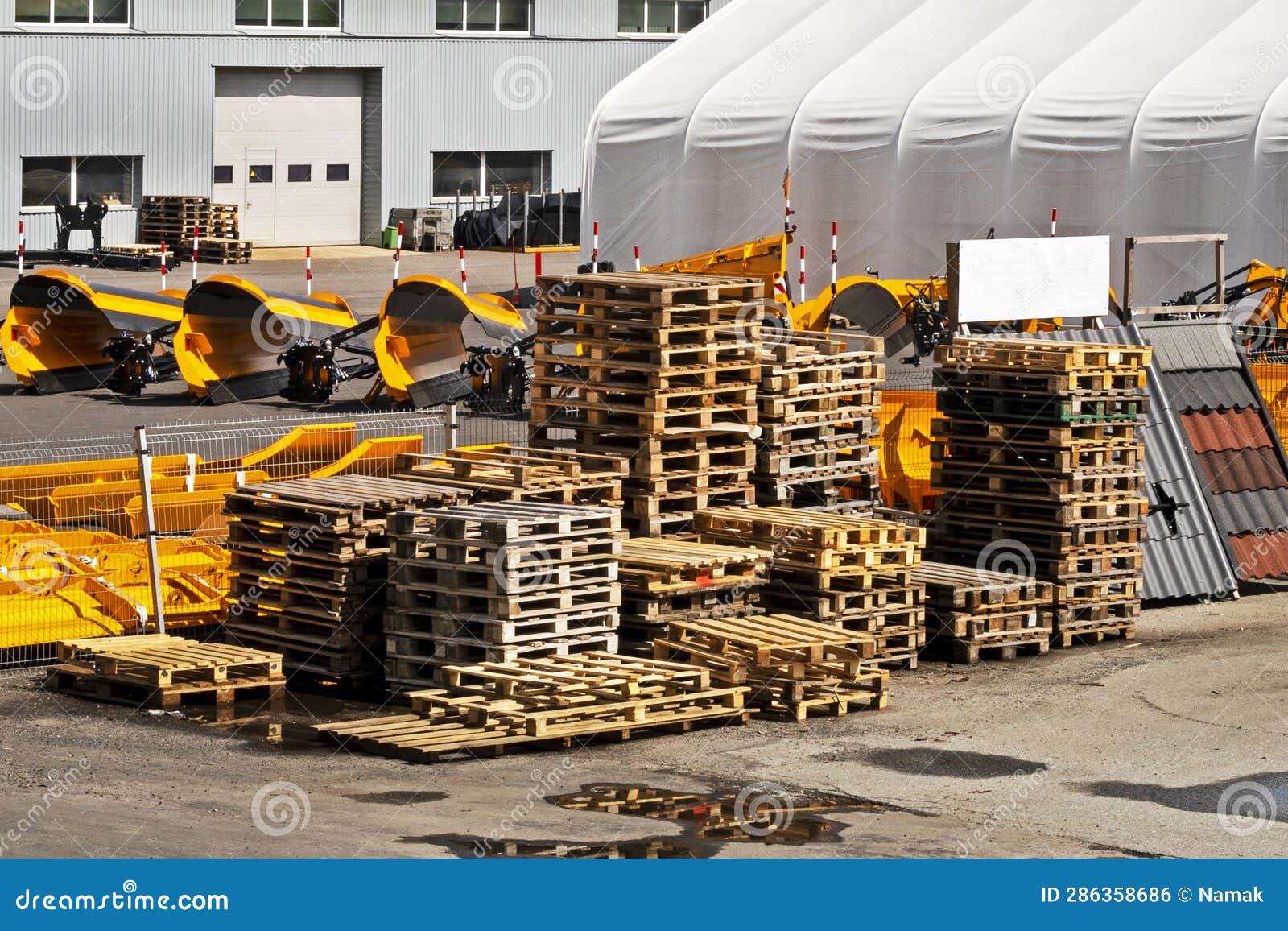 Wooden Pallets with Building Material and Construction Equipment Stock ...