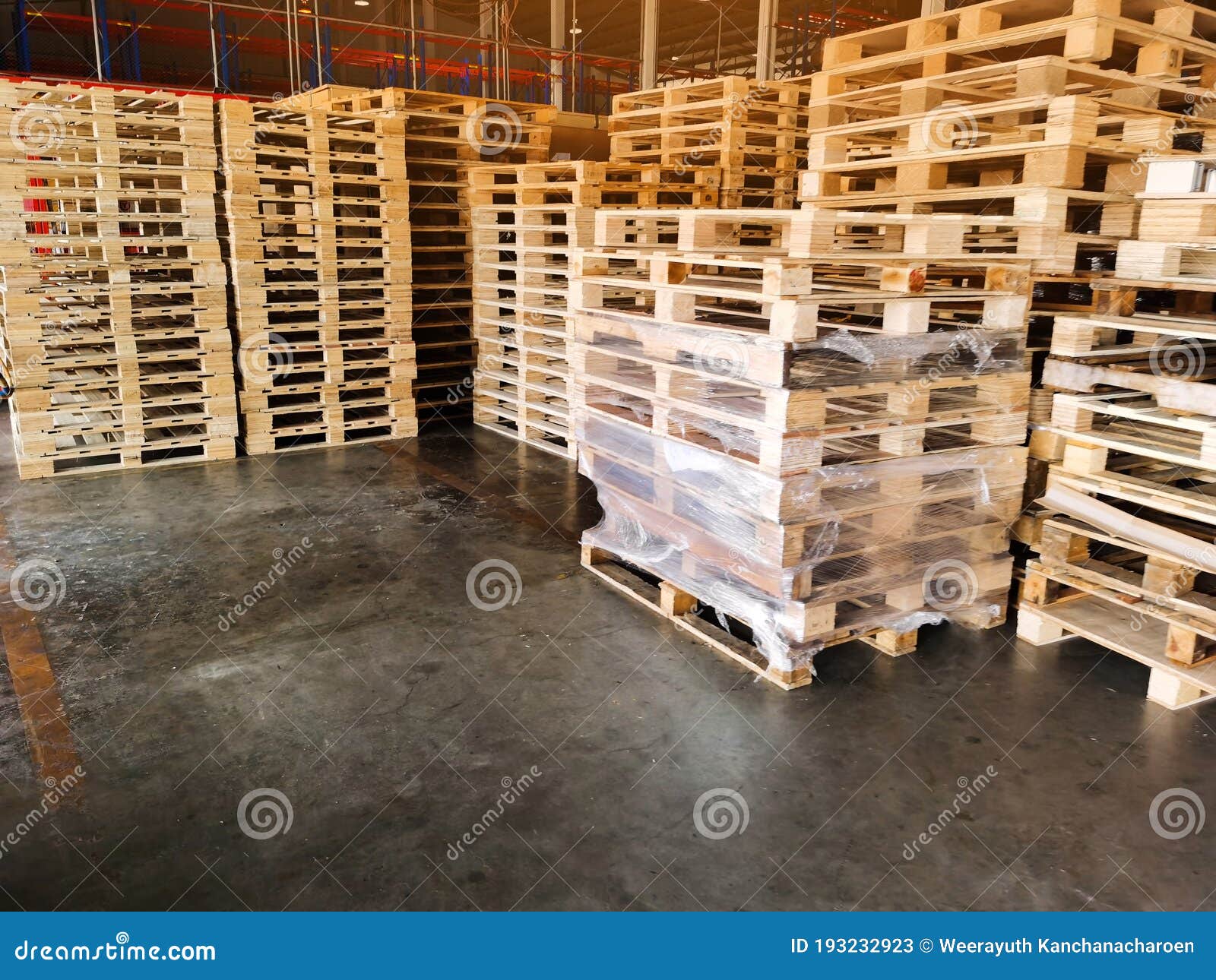 Wooden Pallets Stack at the Freight Cargo Warehouse for Transportation ...