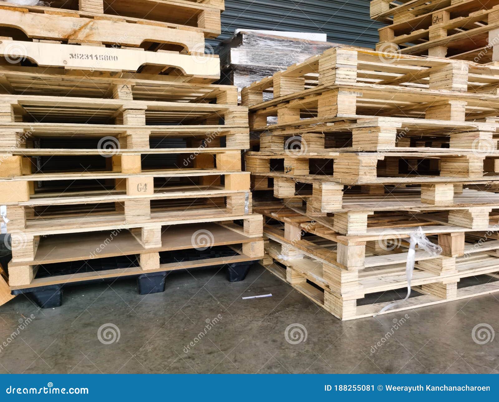 Wooden Pallets Stack at the Freight Cargo Warehouse for Transportation ...