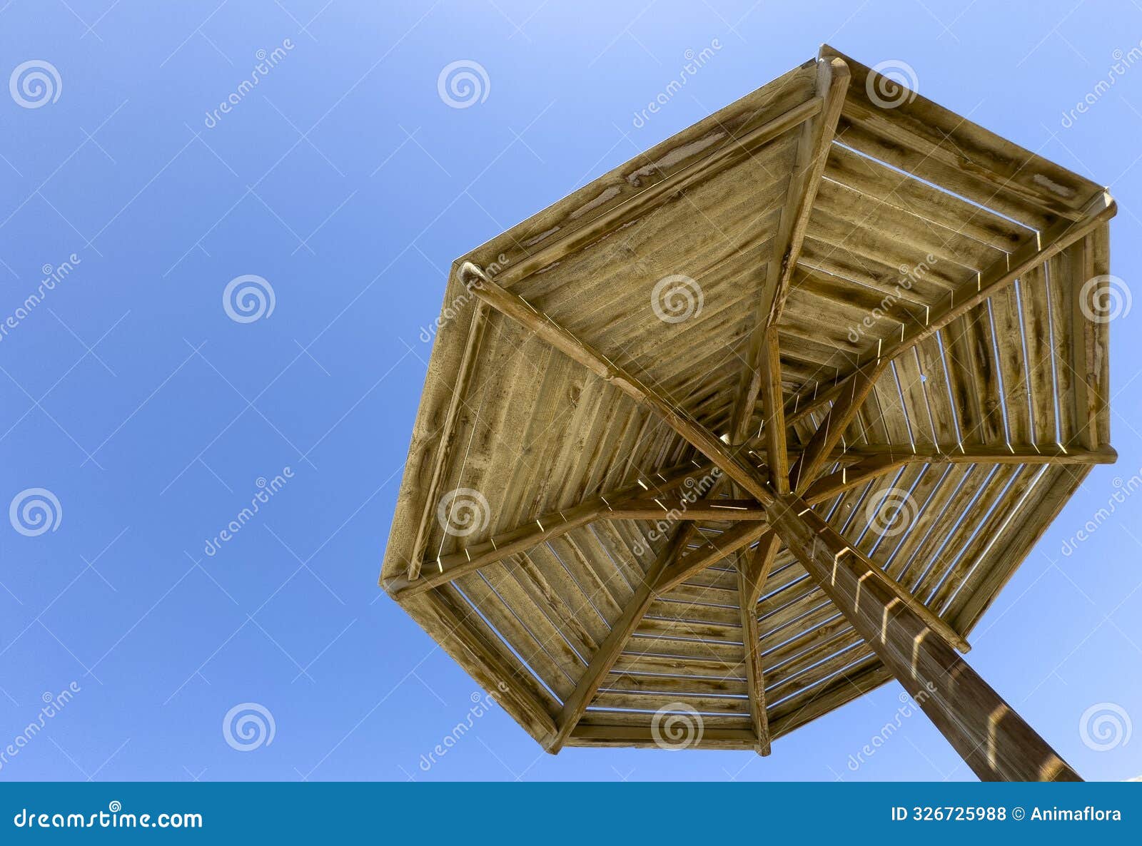 Wooden Parasol with Blue Sky on the Beach Stock Photo - Image of ...