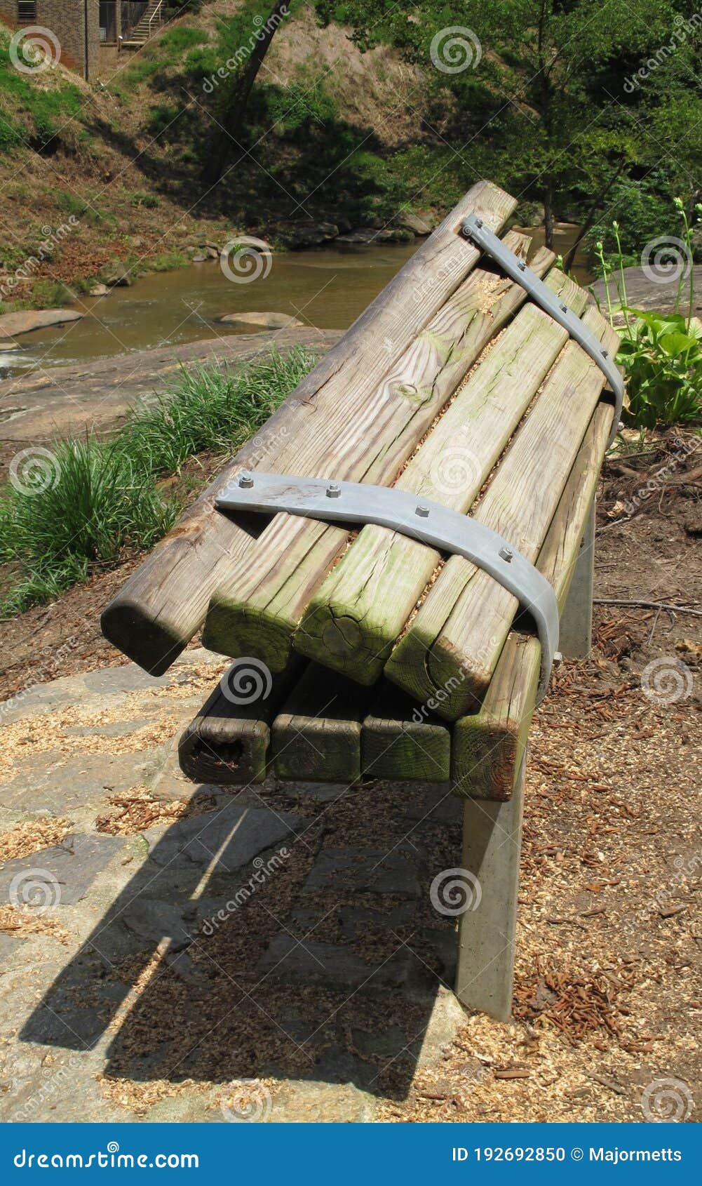 Wooden Park Bench with Back Bent Forward Stock Photo - Image of ...