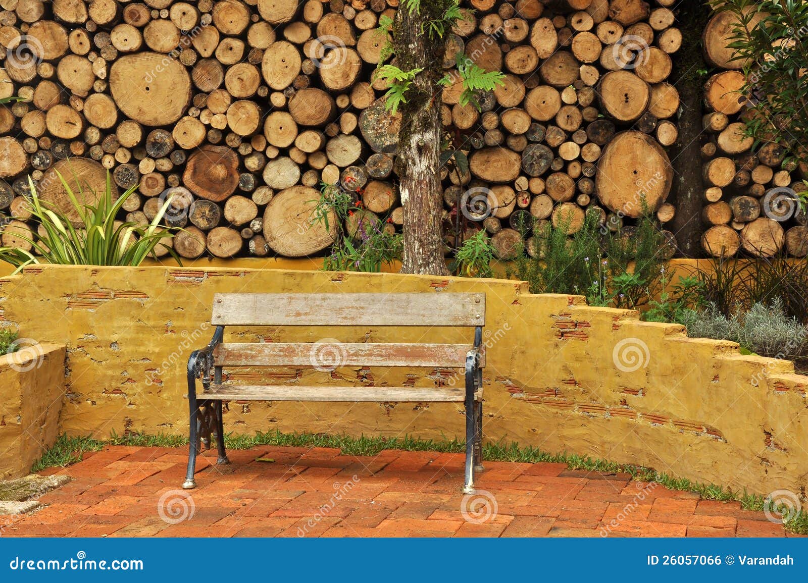 Wooden Park Bench in a Log Wall Stock Photo - Image of shape, bench ...