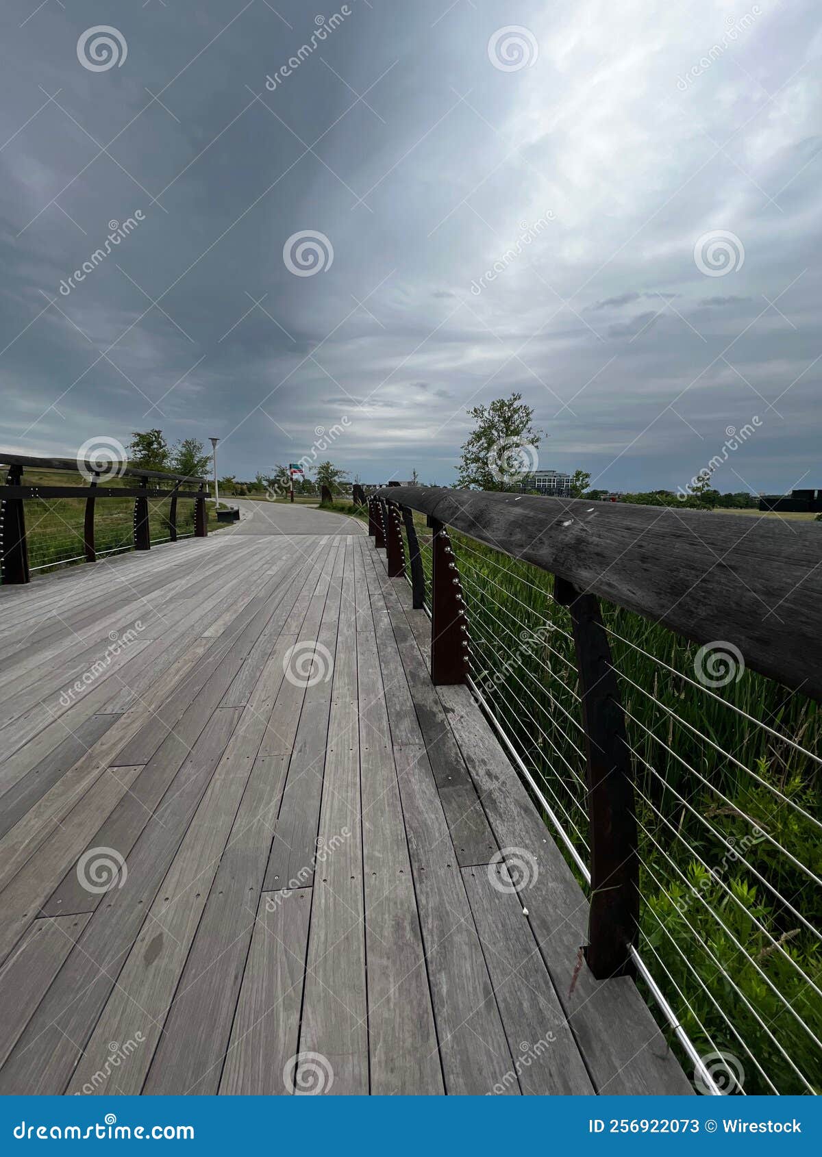 Wooden Pathway in a Field on a Cloudy Day Stock Image - Image of ...
