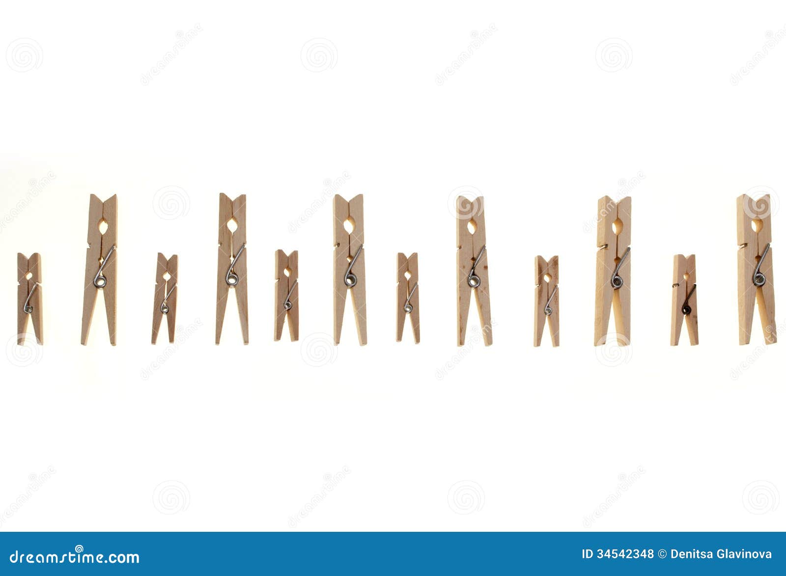 Wooden Pegs Small and Big Isolated on White Stock Photo - Image of ...