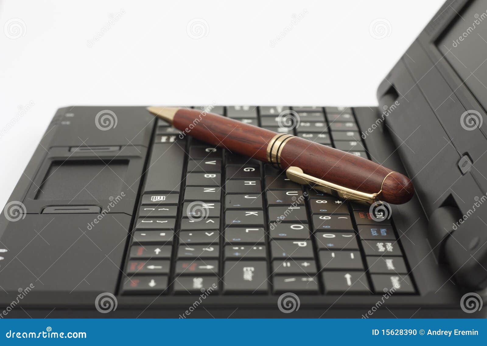 The Wooden Pen on Notebook Keyboard Stock Photo - Image of brown ...