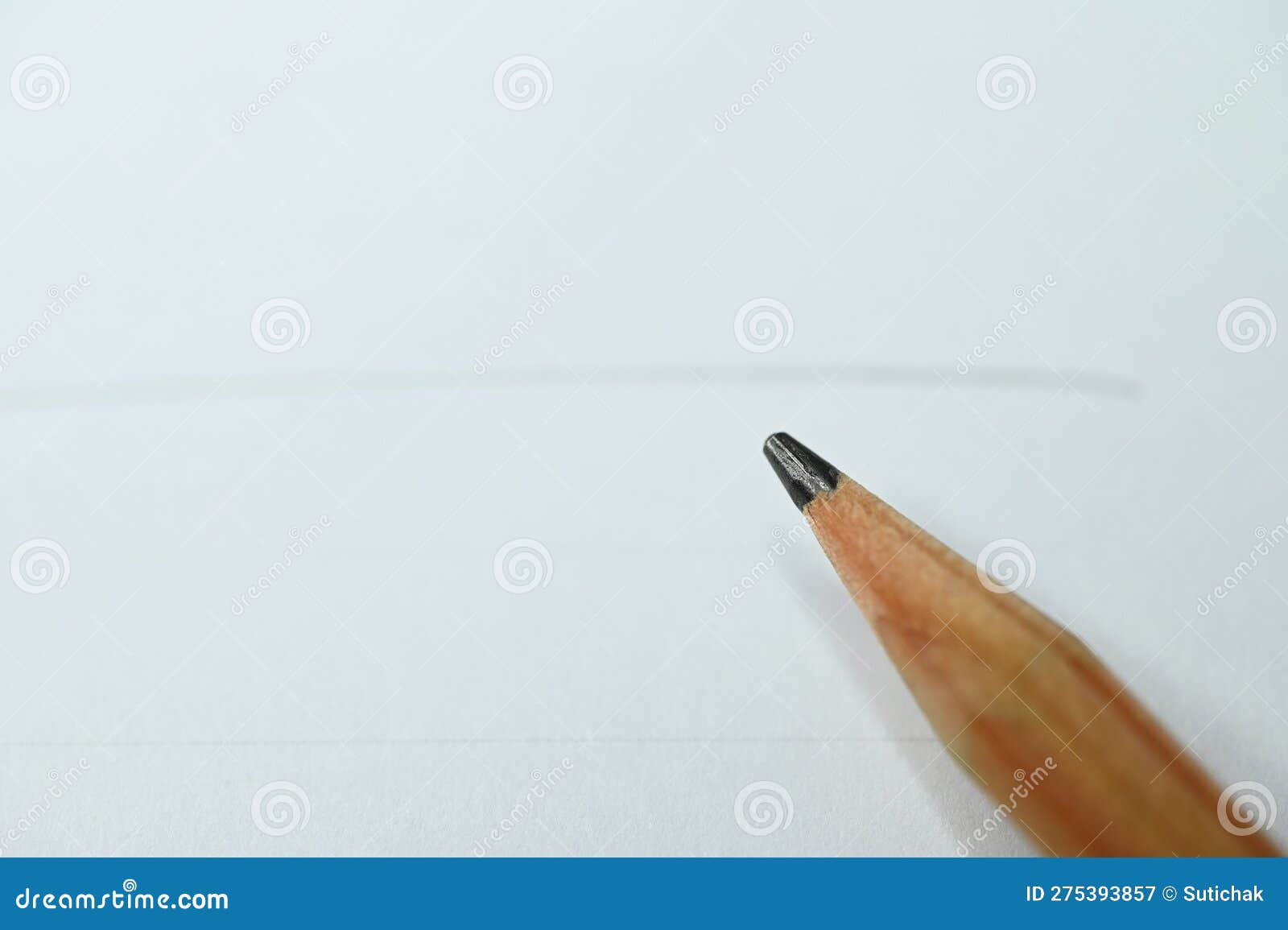Close Up Sharp Brown Wooden Pencil on White Paper Stock Image - Image ...