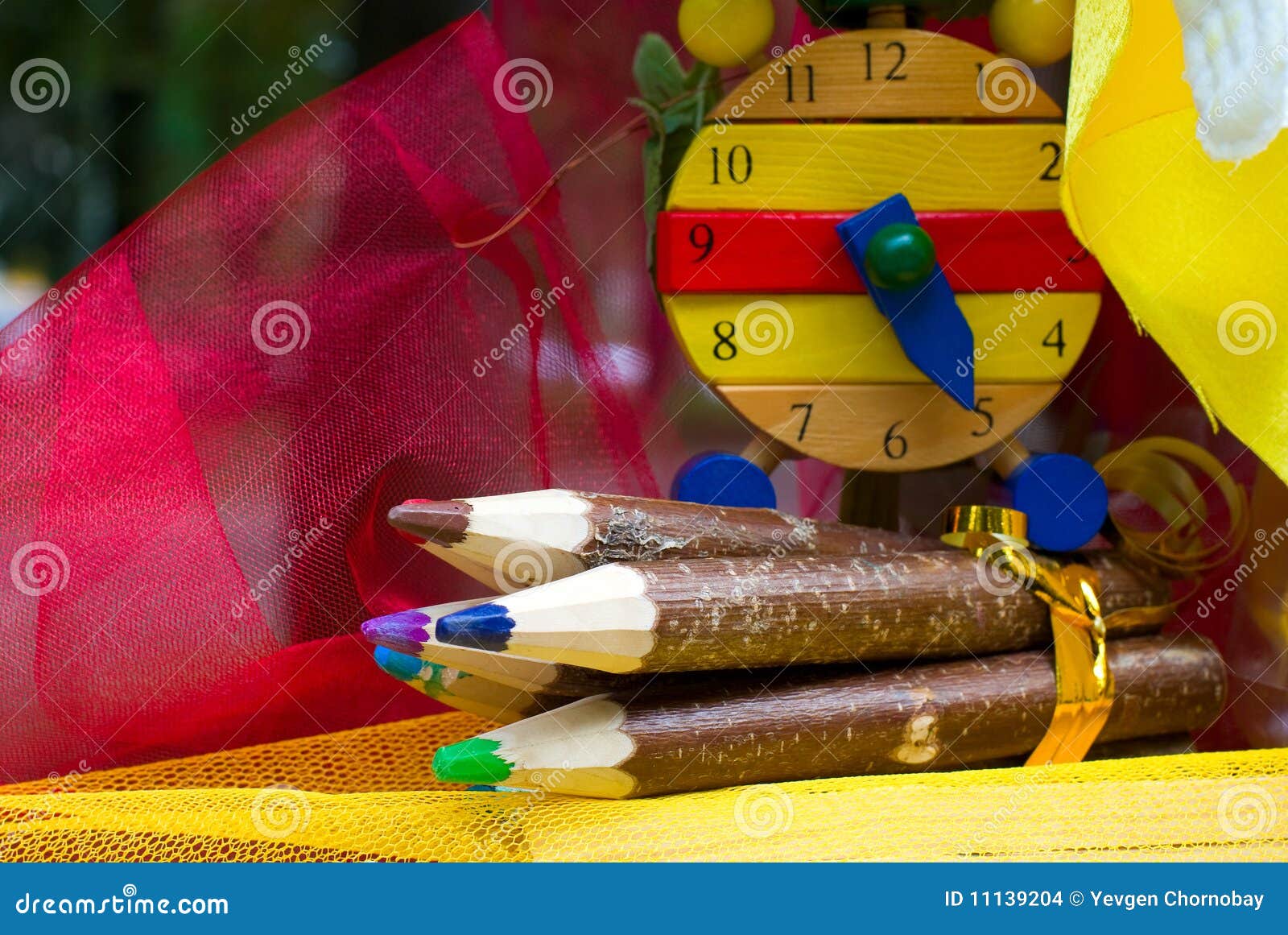 Wooden pencils and clock stock photo. Image of education - 11139204