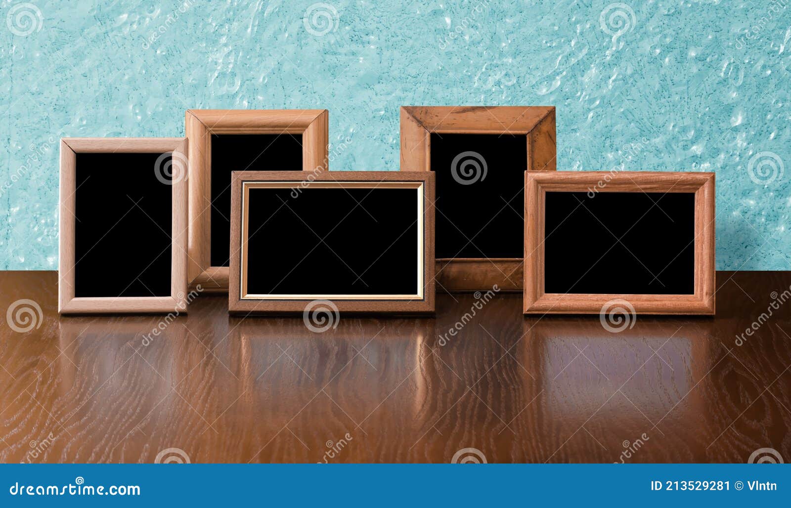 Photo frames on table stock image. Image of brown, deco - 213529281