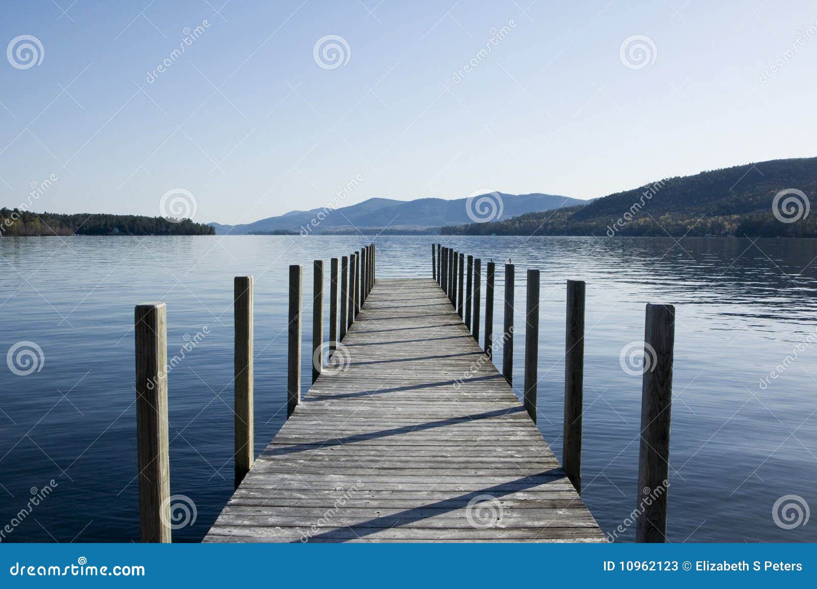 Wooden Pier stock image. Image of mountains, water, landscape - 10962123