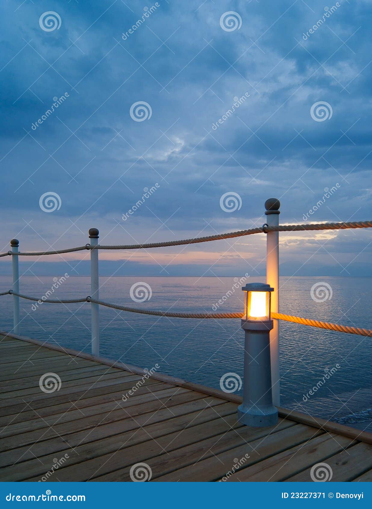 Wooden Pier with Lamp at Sunset Stock Image - Image of overcast ...