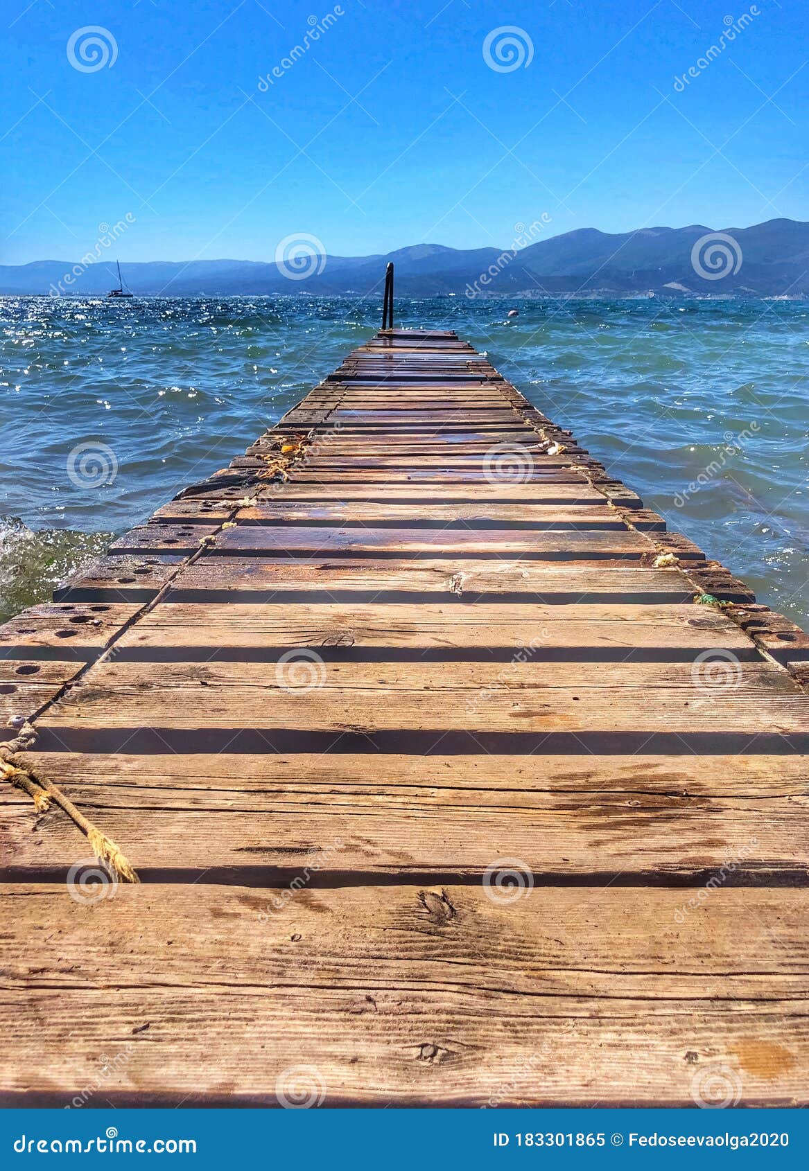 Wooden Pier by Sea. Boards of the Pier and Sea Waves Stock Image ...