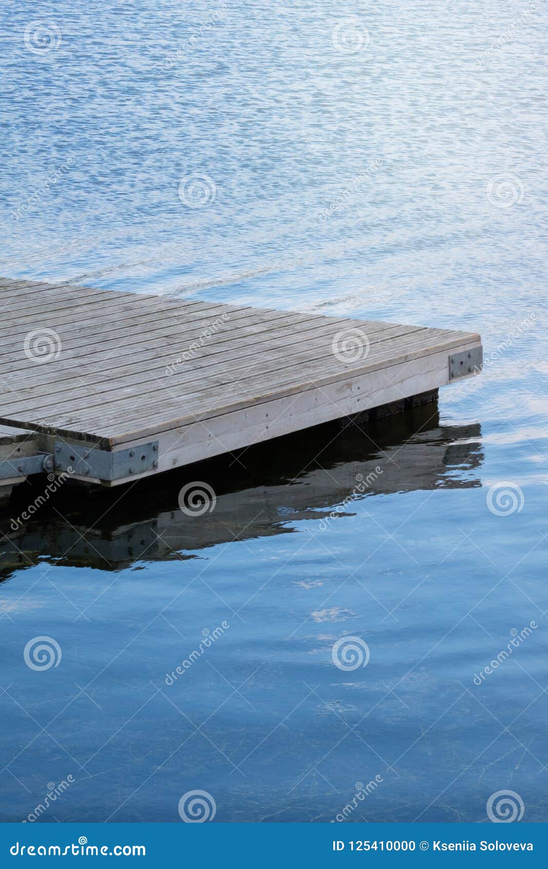 Wooden Pier on the Background of Water. Stock Photo - Image of sand ...