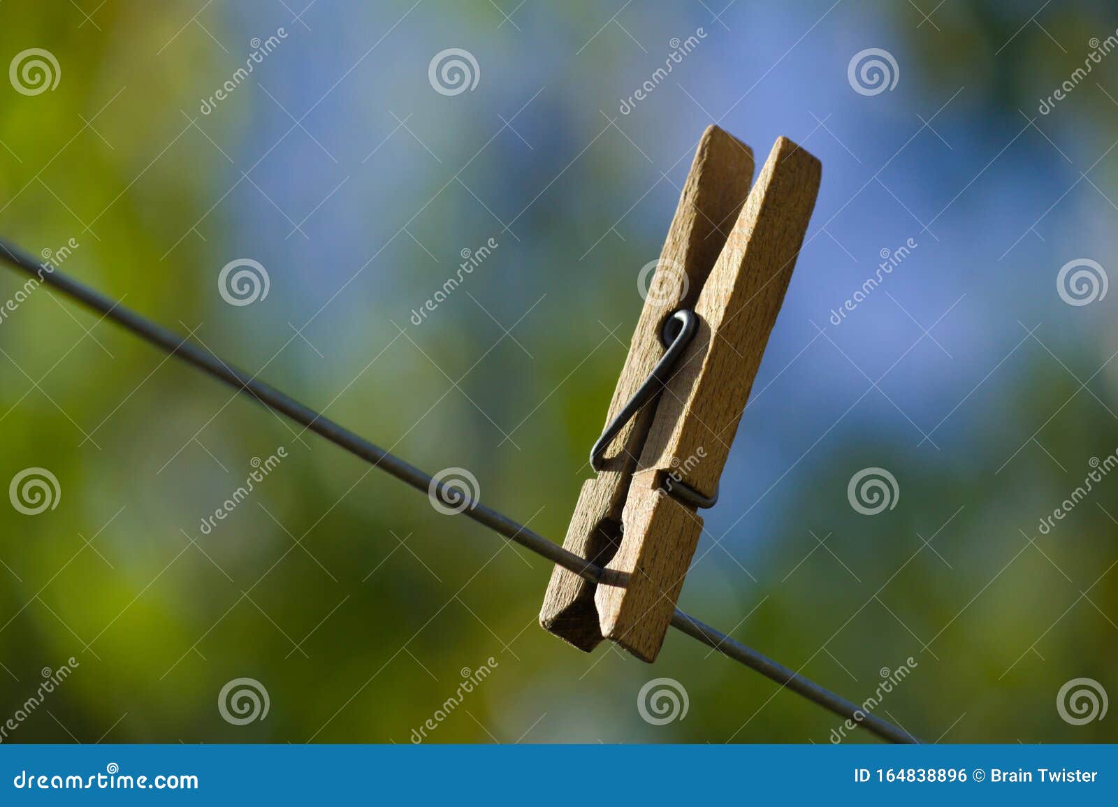 The Wooden Pinch on Wire with Blur Background Stock Photo - Image of ...