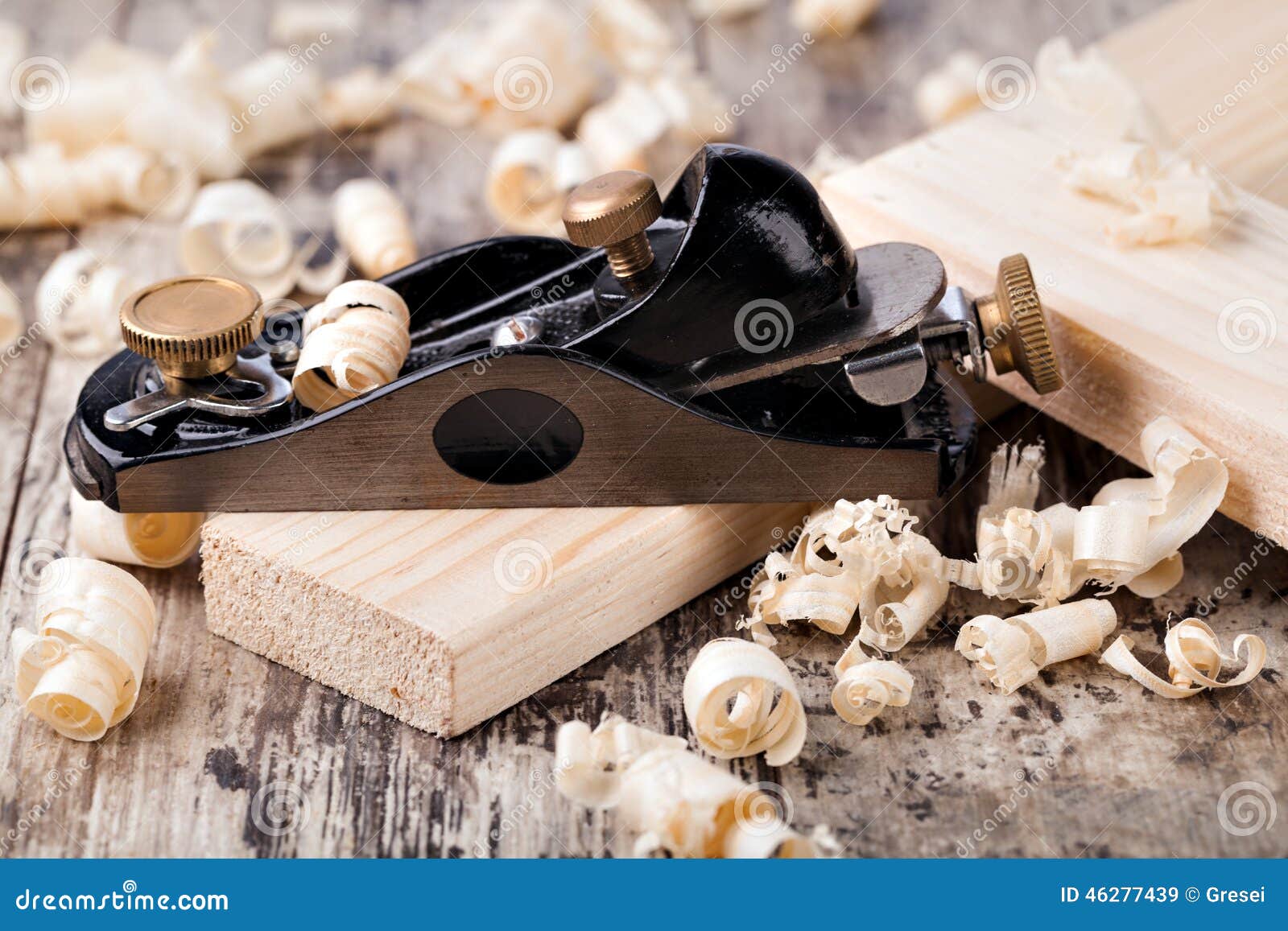 Wooden plane and shaving stock image. Image of carpentry - 46277439