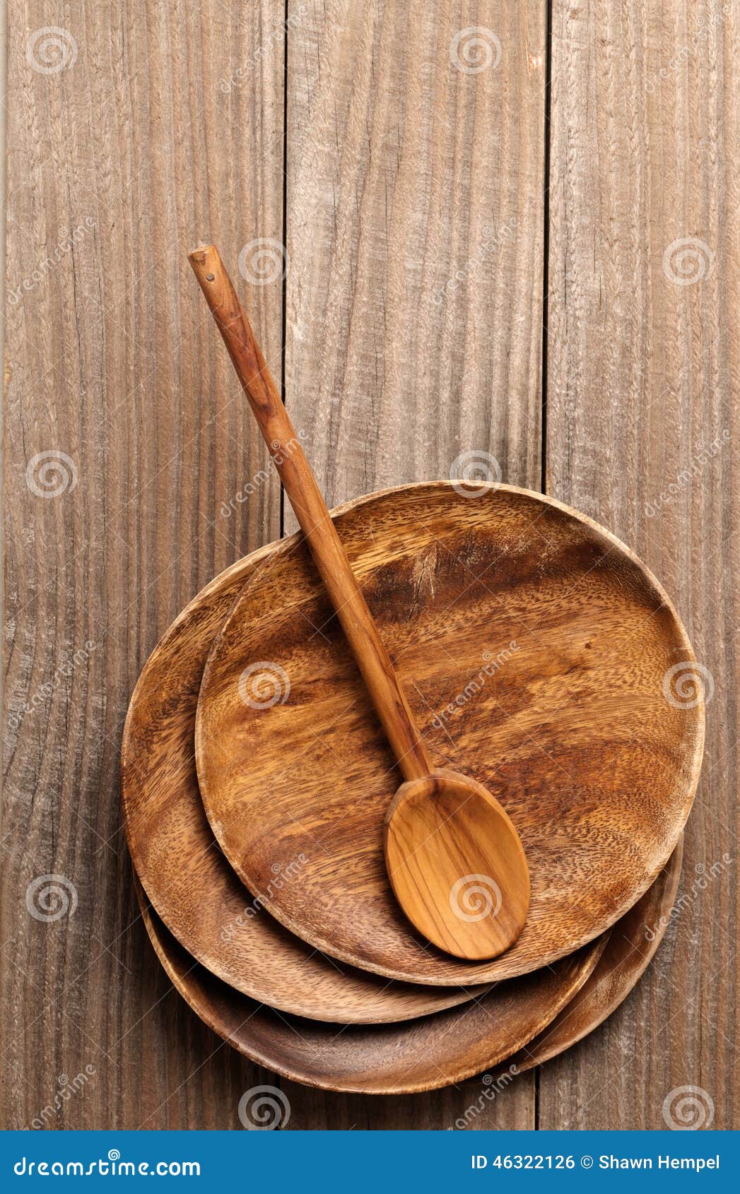 Wooden Plates and Spoon on Table Stock Photo - Image of handicraft ...
