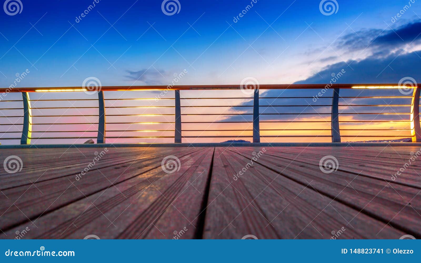 Wooden Platform and Railing on the Background of a Bright Sunset ...