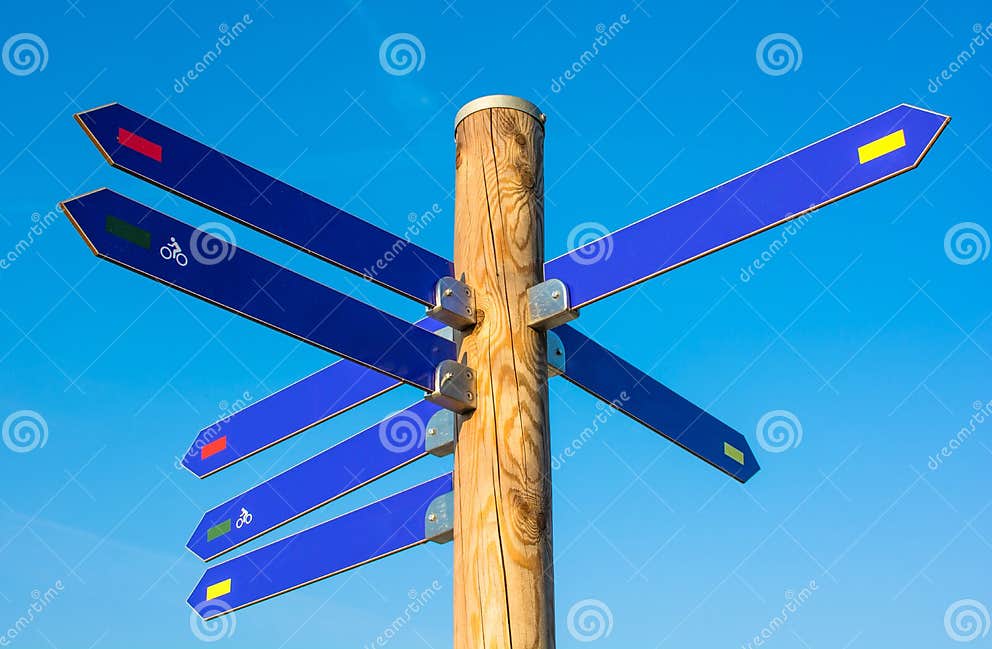 Wooden Pole with Direction Arrows Stock Image - Image of movement ...