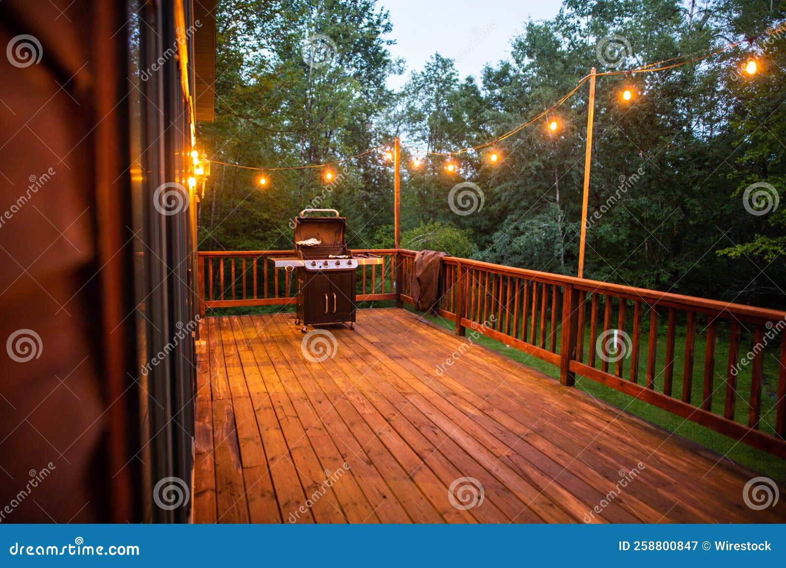 Wooden Porch with String Lights and Grill Stock Image - Image of light ...