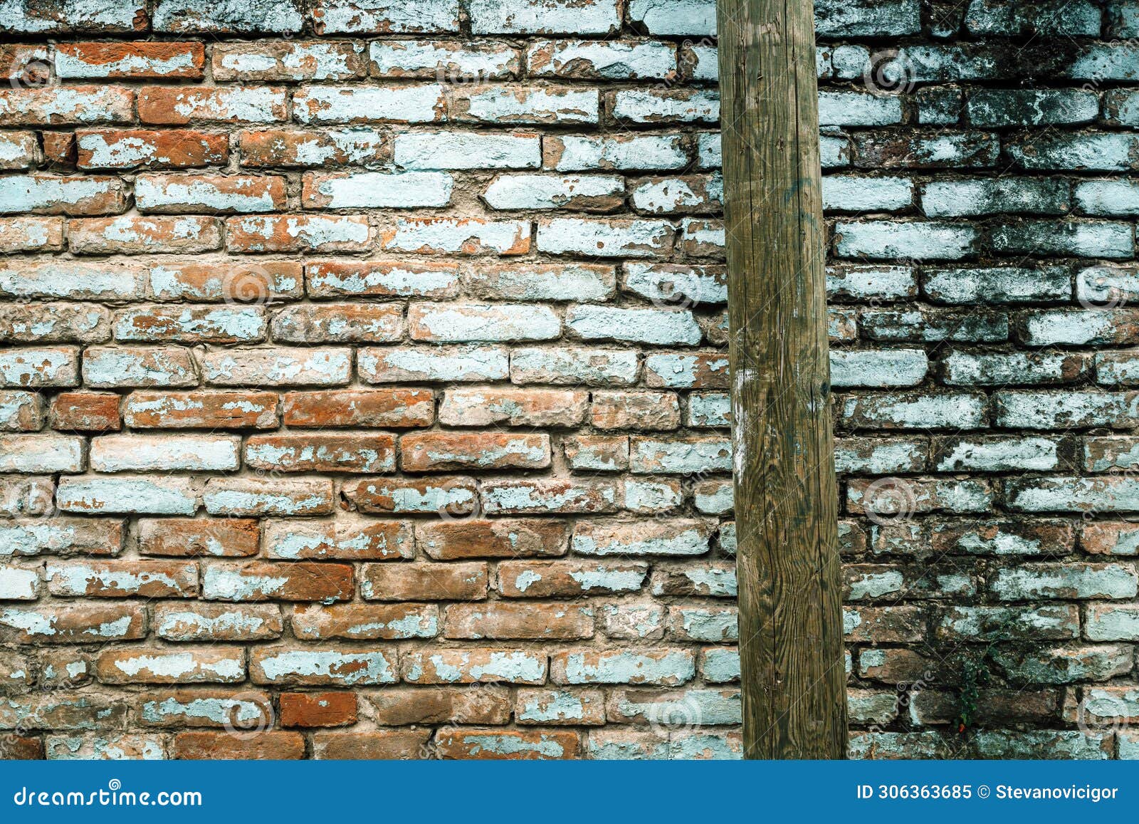 Wooden Post in Front of Worn Brick Wall Surface, Urban Street ...