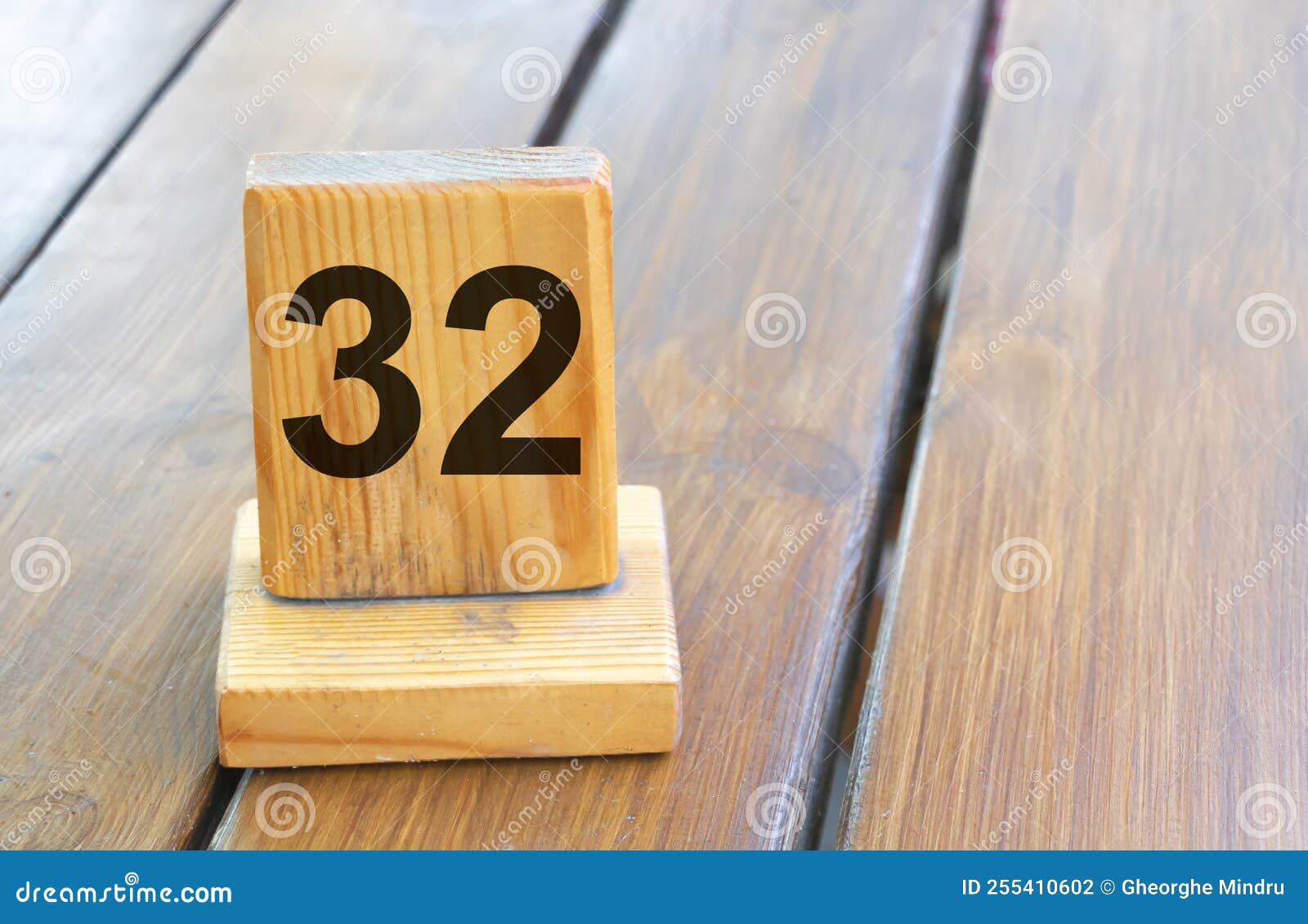 Wooden Priority Number 32 on a Plank Tab Stock Photo - Image of ...