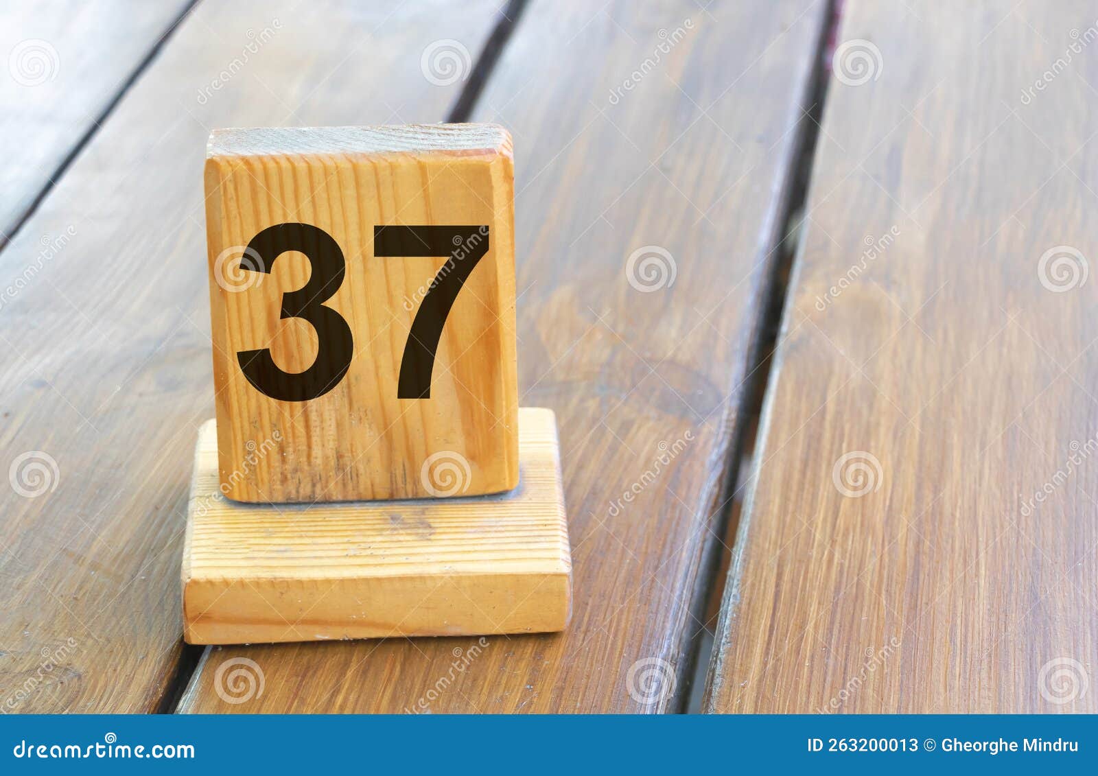 Wooden Priority Number 37 on a Plank Tab Stock Image - Image of desk ...