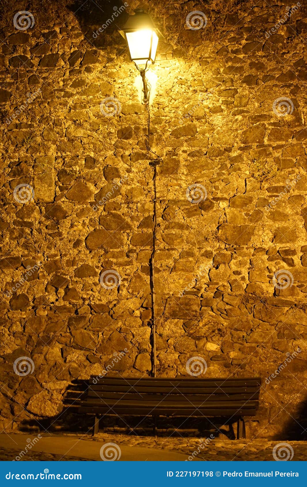 Wooden Public Bench Under a Lamp Lit at Night. Stock Photo - Image of ...
