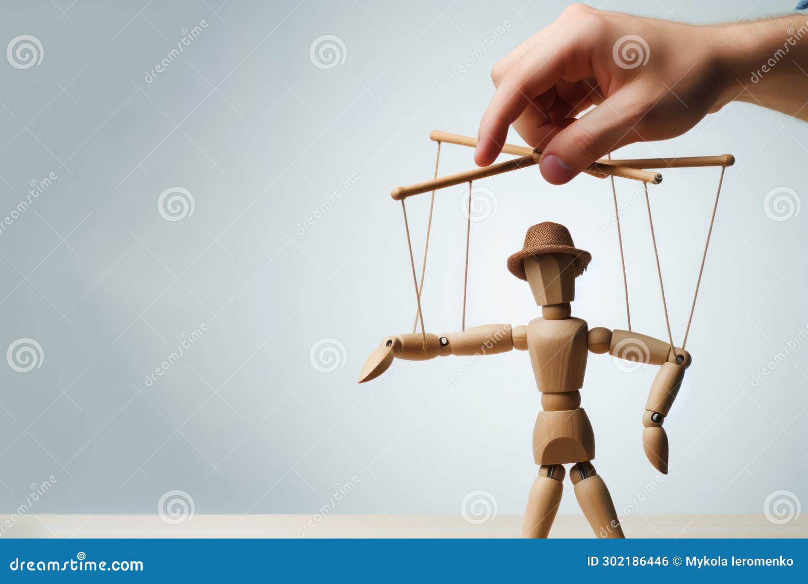 A Wooden Puppet Controlled by a Puppeteer. Space for Text. Stock ...