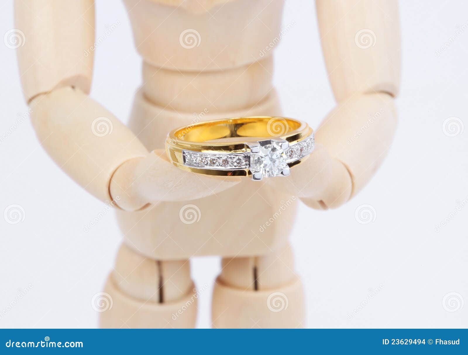 Wooden Puppet Holding Golden Ring with Diamond. Stock Photo - Image of ...