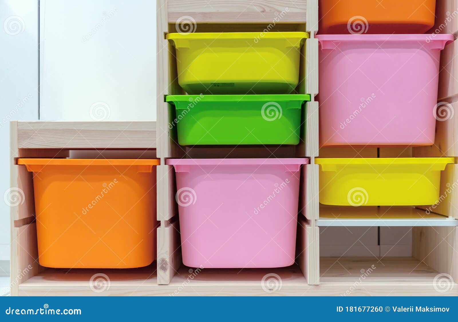 Wooden Rack with Multi-colored Retractable Plastic Boxes Stock Photo ...