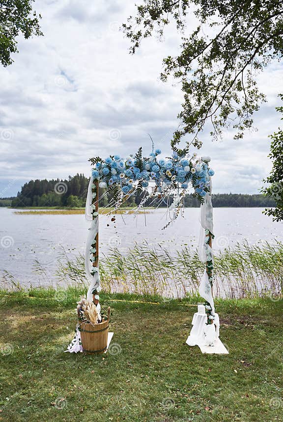 Wooden Rectangular Wedding Arch Decorated with Flowers Stock Photo ...