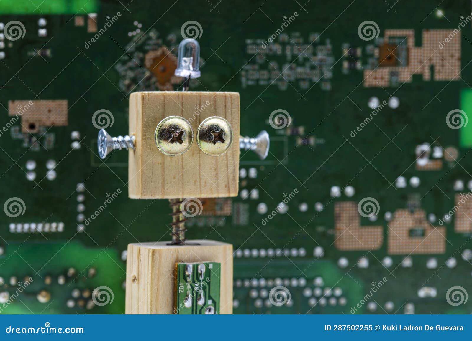Wooden Robot in Front of an Electronic Circuit Panel Stock Image ...
