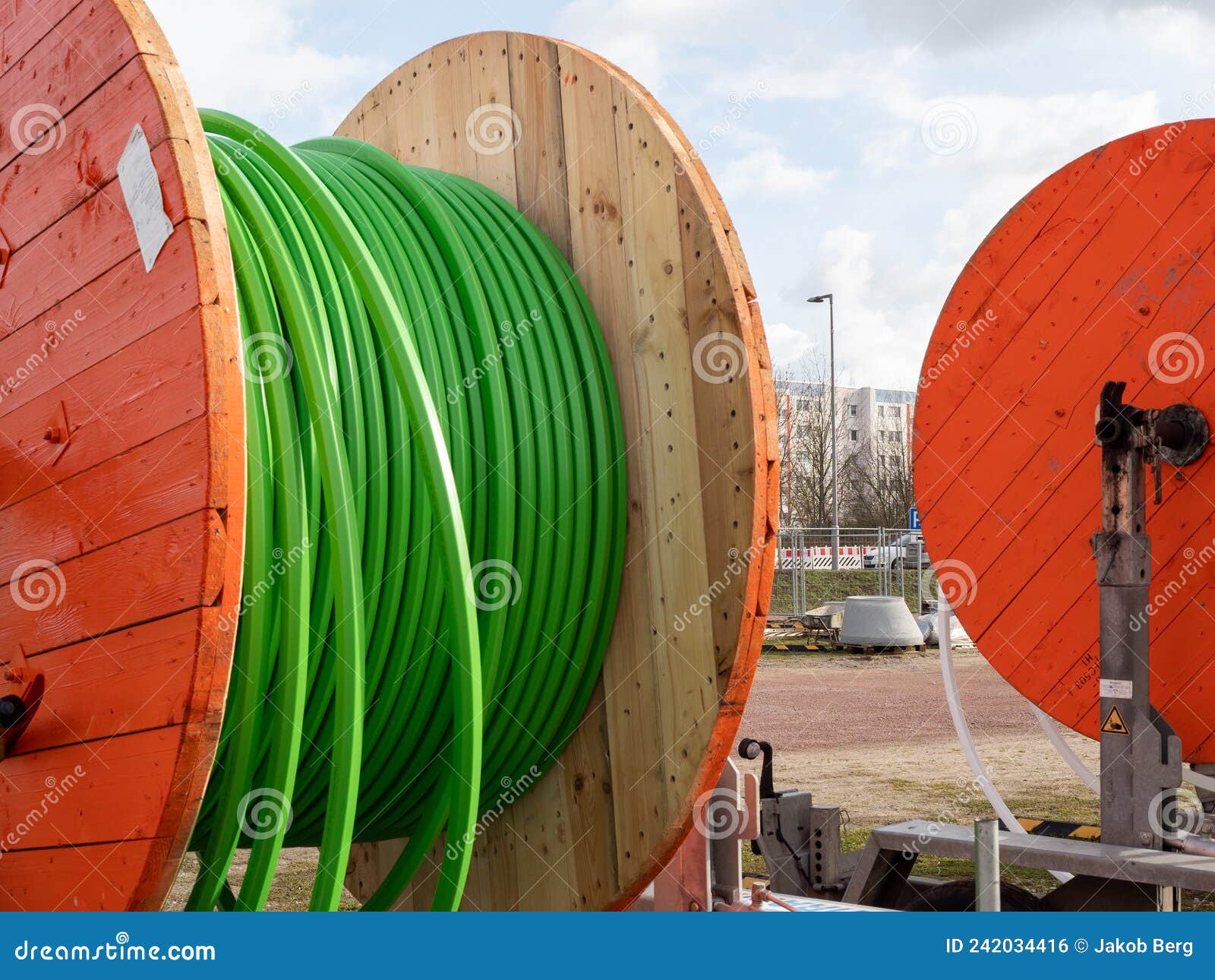 Wooden Roller with Green Fiber Optic Cables for Laying Data Cables at ...