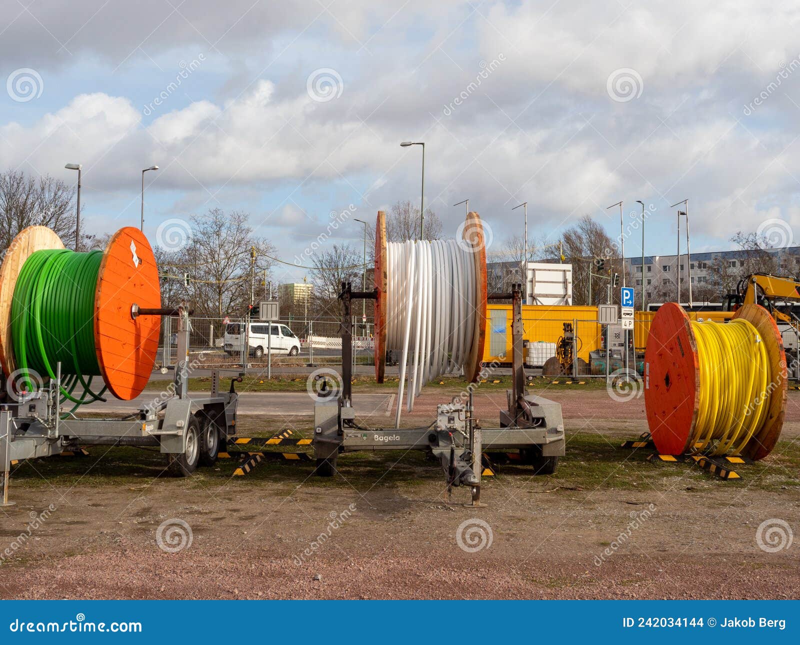 Wooden Rollers with Multi-colored Fiber Optic Cables for Laying Data ...