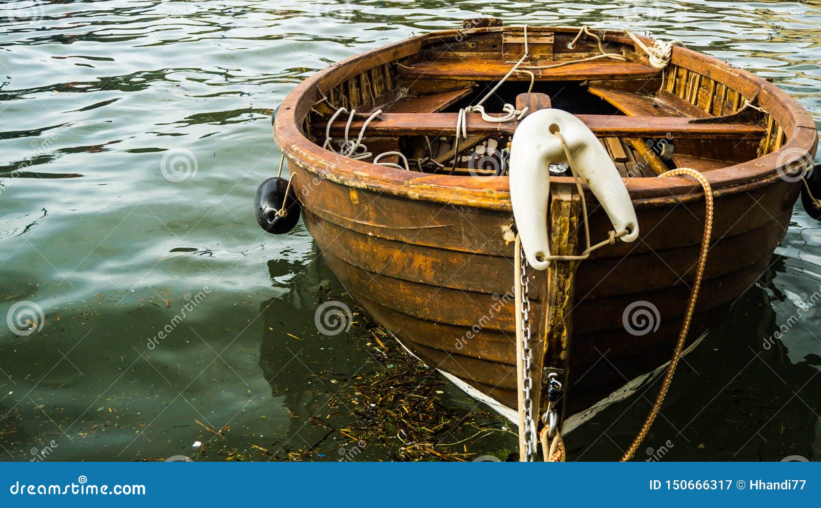 Brown old wooden rowboat stock image. Image of boat - 150666317