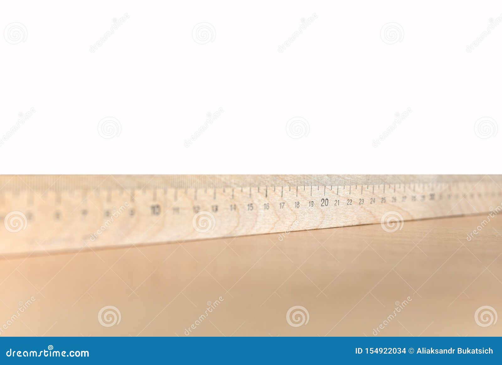 Wooden Ruler on the Table and White Background, Copyspace Stock Photo ...