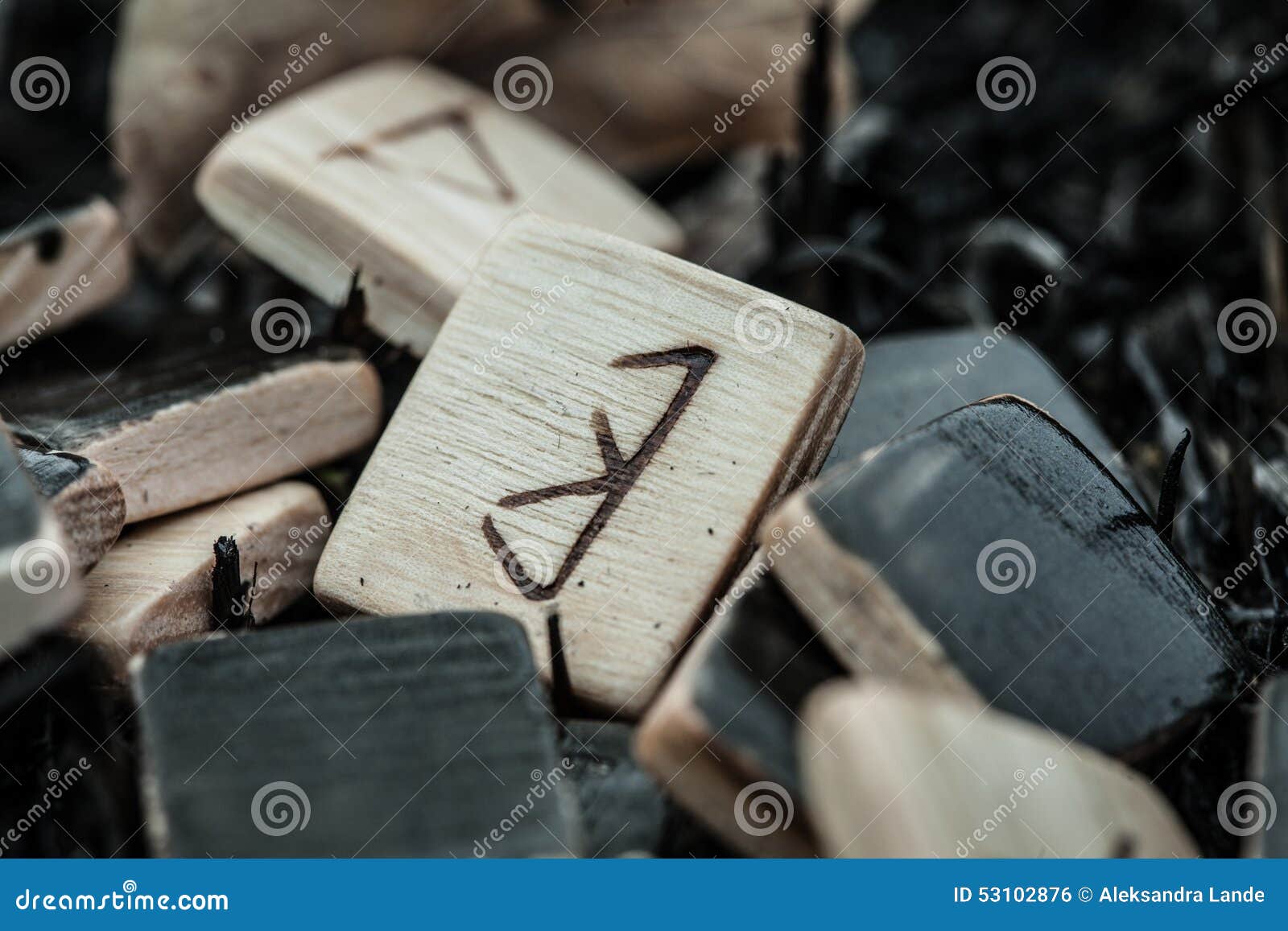 Wooden runes on the ground stock photo. Image of alphabet - 53102876