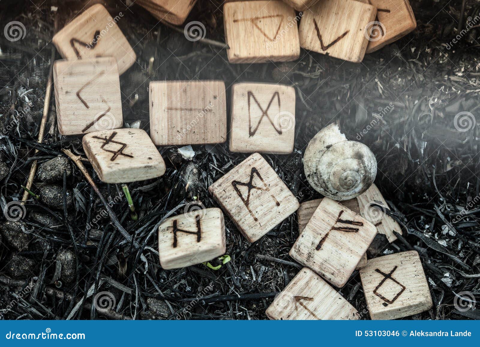 Wooden runes on the ground stock photo. Image of mysterious - 53103046