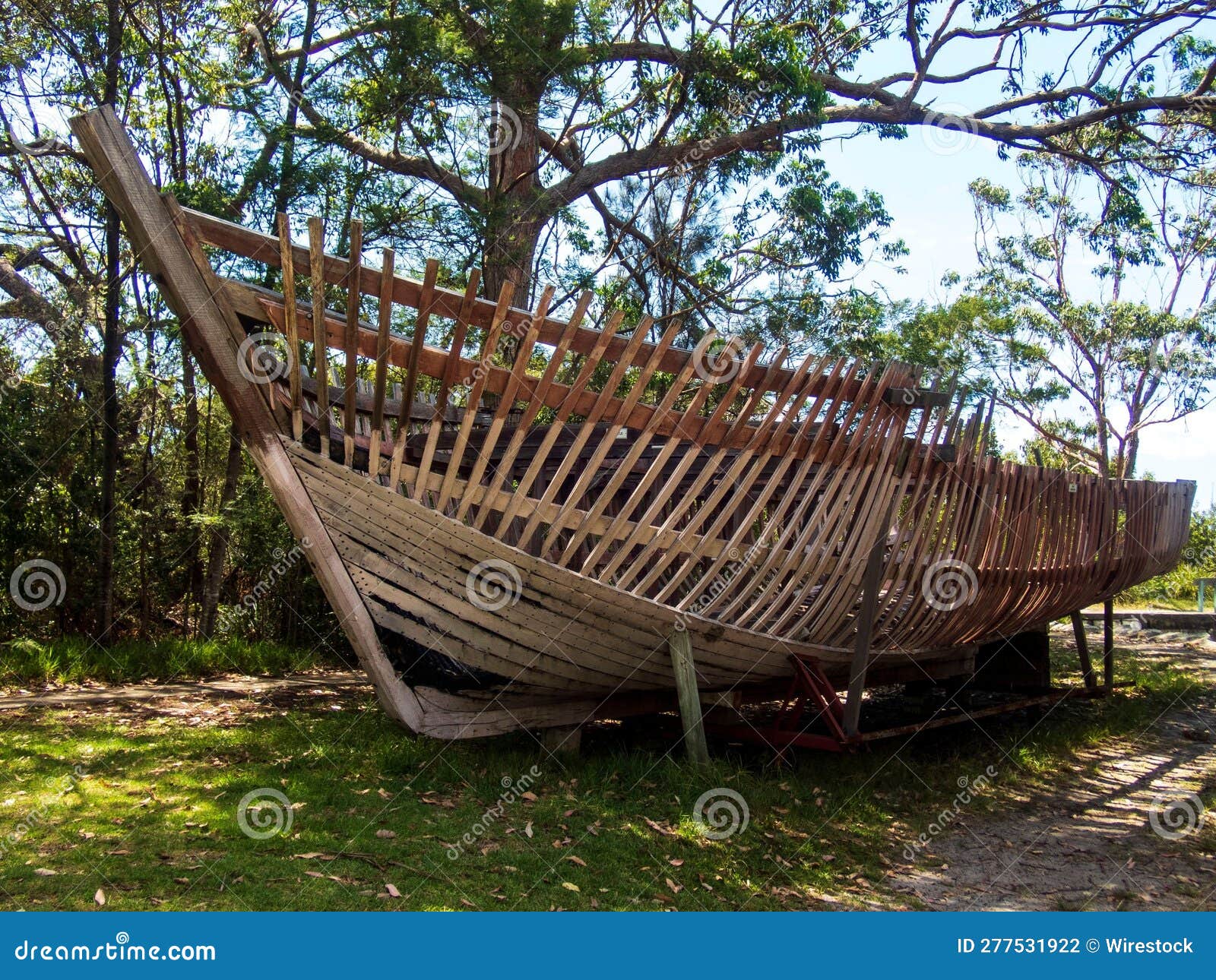 Wooden Sailing Boat in Front of a Large Tree Stock Photo - Image of ...