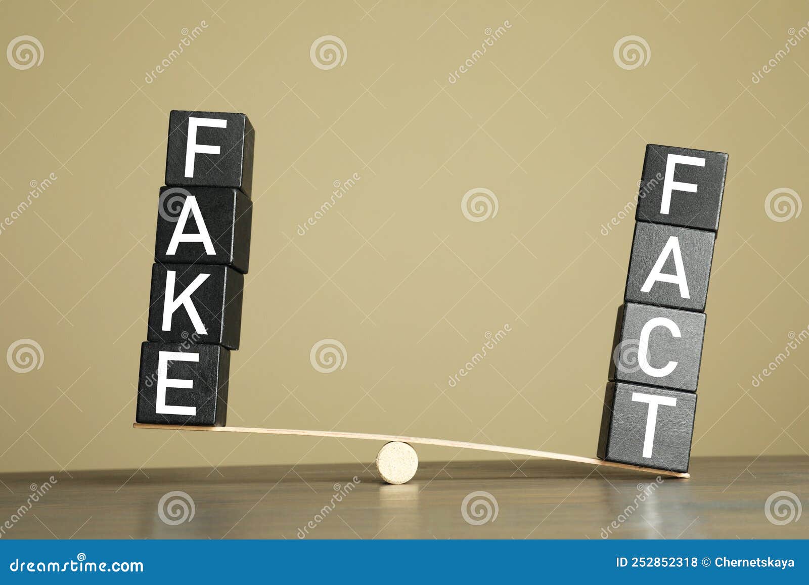 Wooden Scale with Words FAKE and FACT on Table Stock Photo - Image of ...