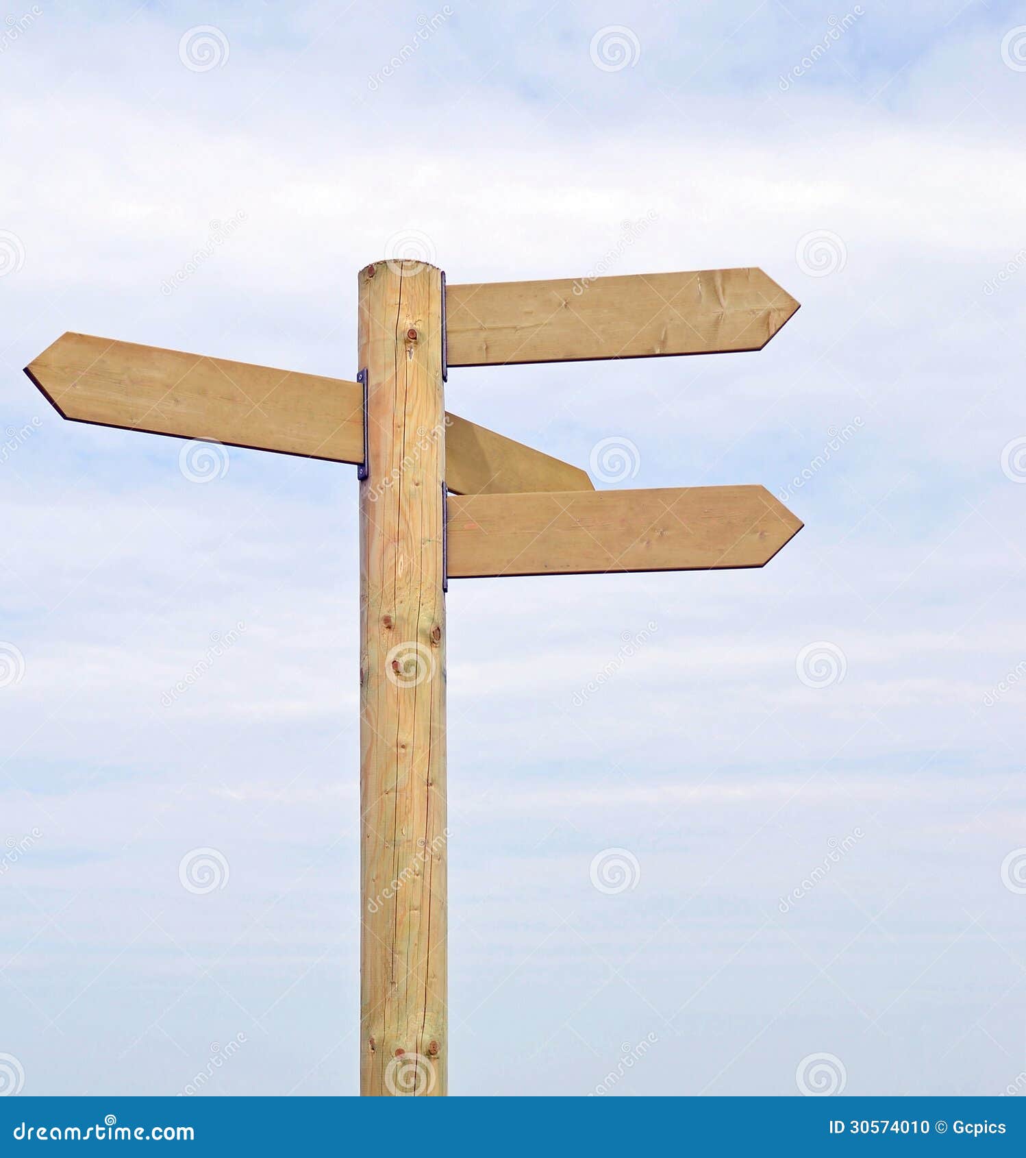Wooden Signpost Along A Misty Path In A Forest Setting. Stock Photo ...