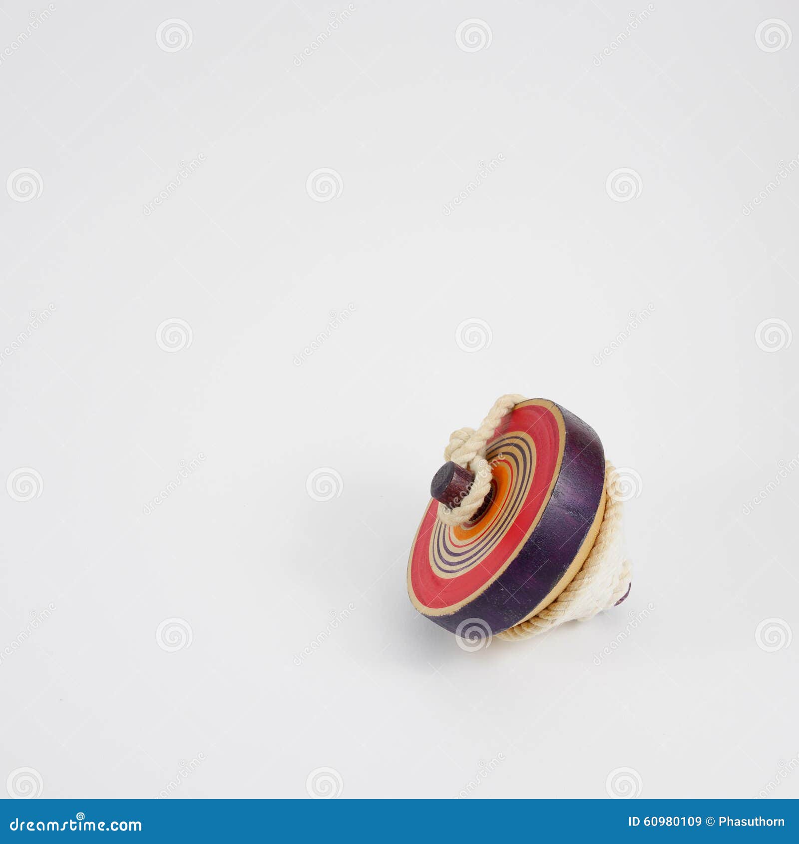 Wooden spinning top toy stock image. Image of play, white - 60980109