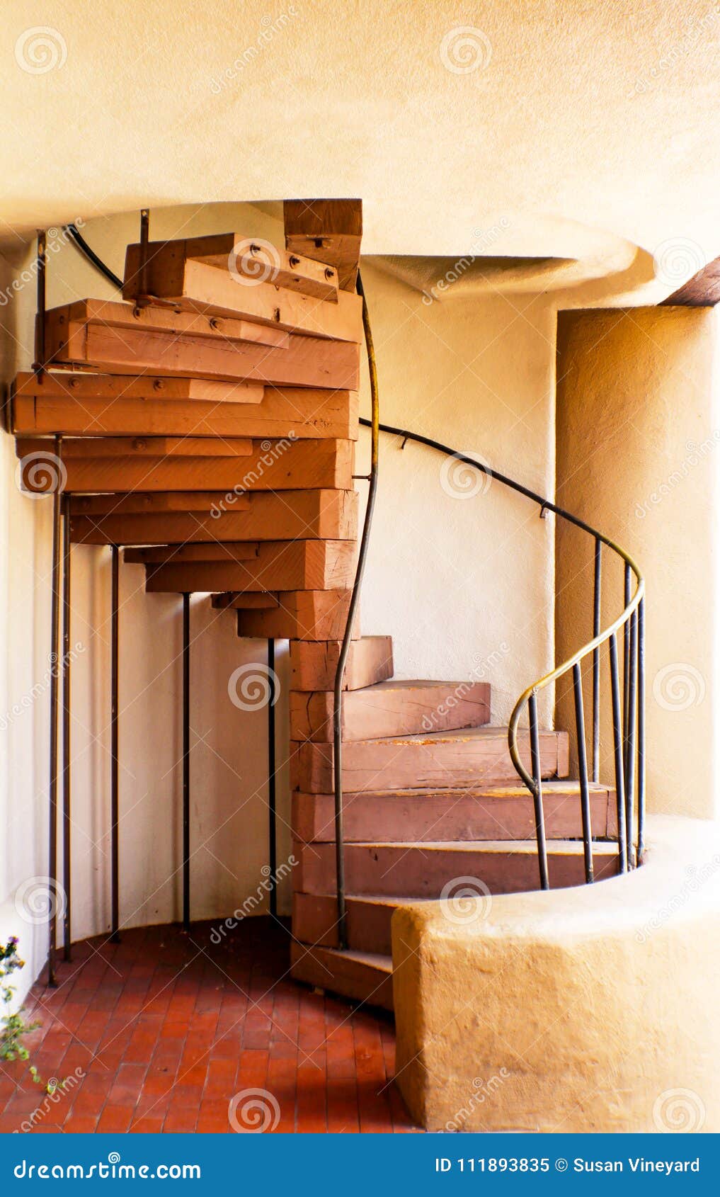 Wooden Spiral Staircase in Adobe Building Stock Image - Image of glass ...