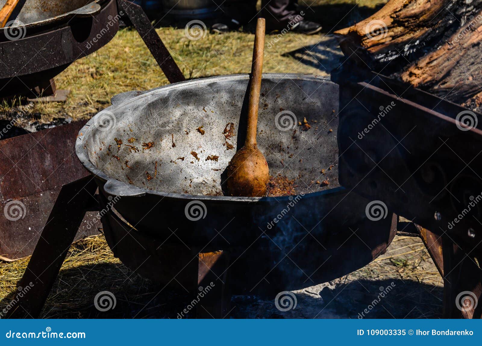 Spoon in a big cauldron stock image. Image of horror - 109003335